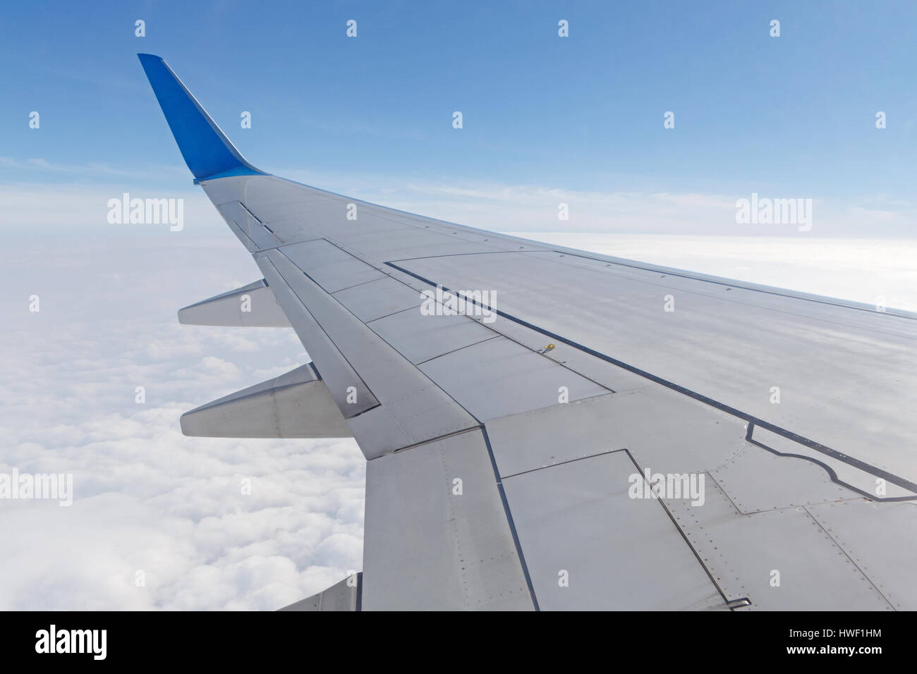 wing of aircraft above clouds Stock Photo - Alamy