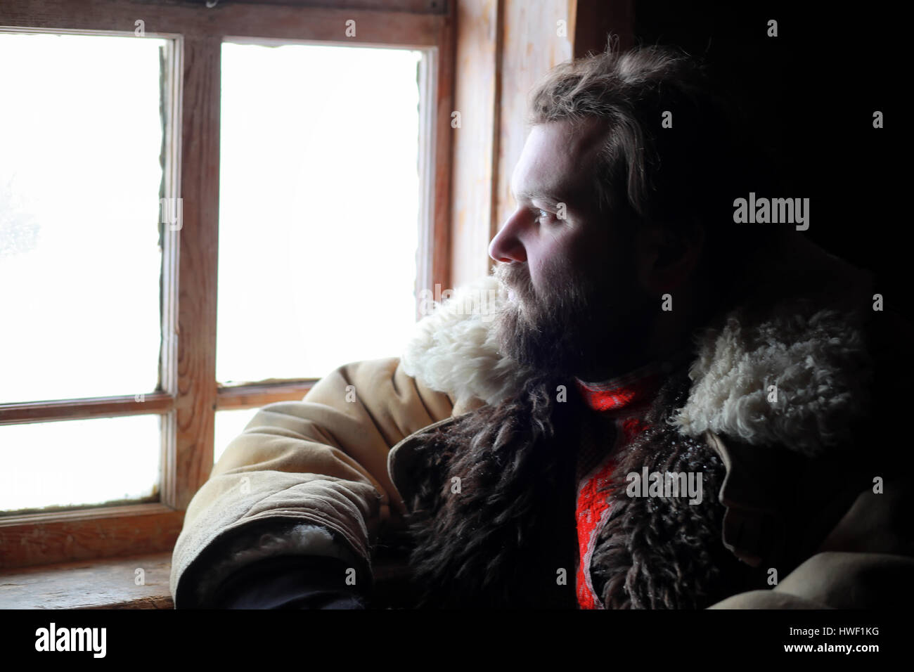 man in traditional winter costume of peasant medieval age in rus Stock ...