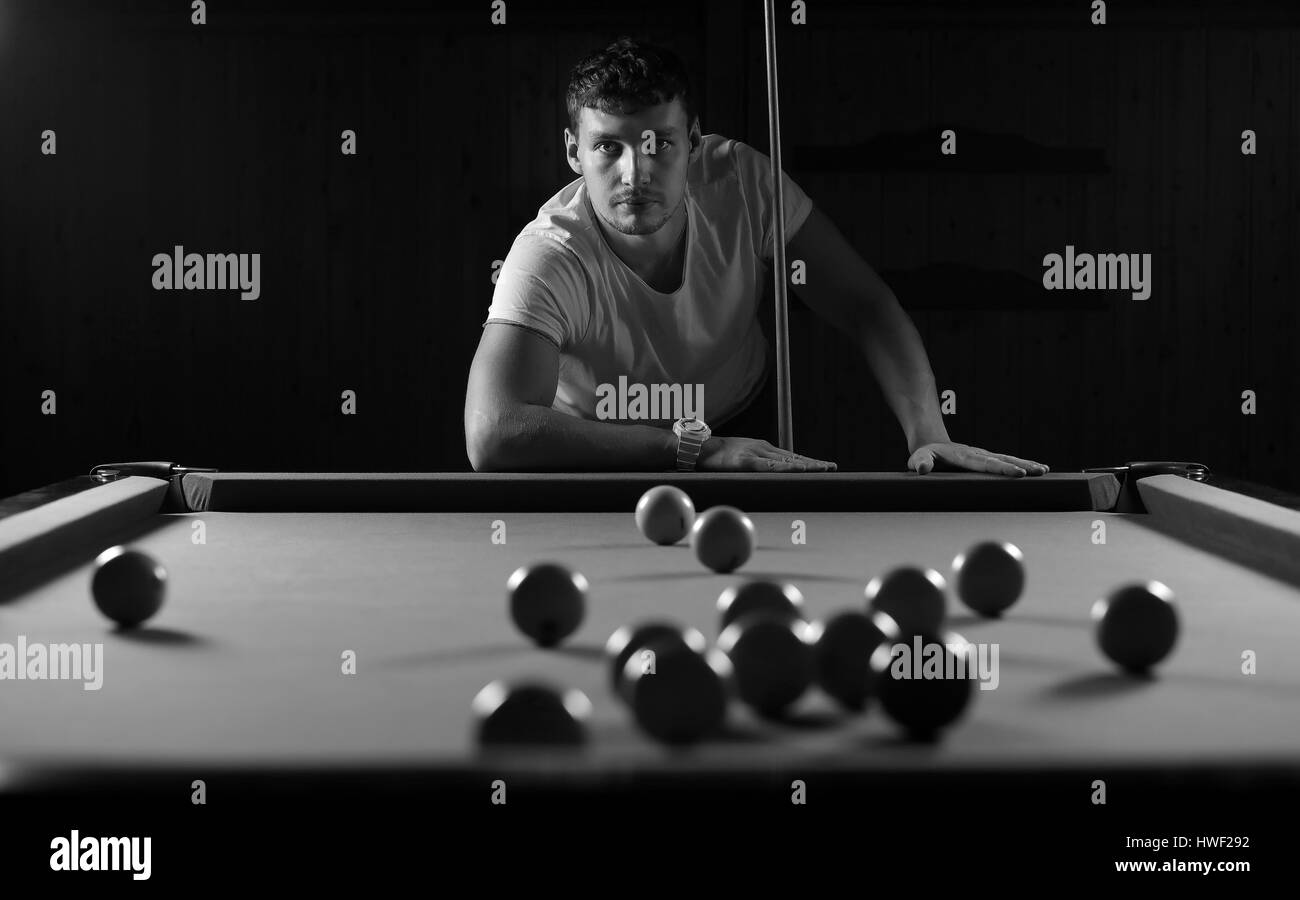 monochrome photo young man playing billiards Stock Photo - Alamy