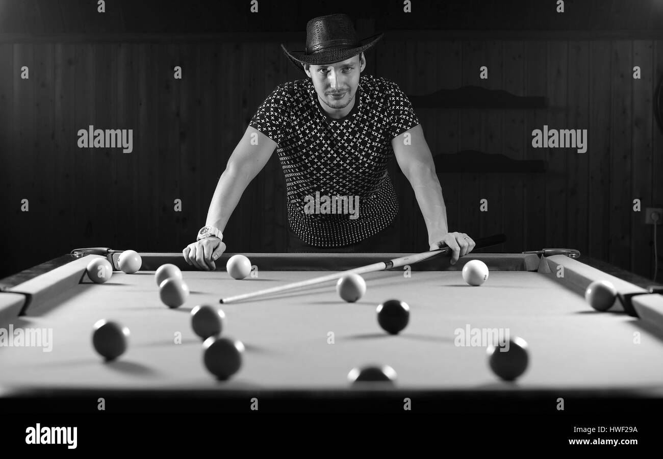 monochrome photo young man playing billiards Stock Photo - Alamy