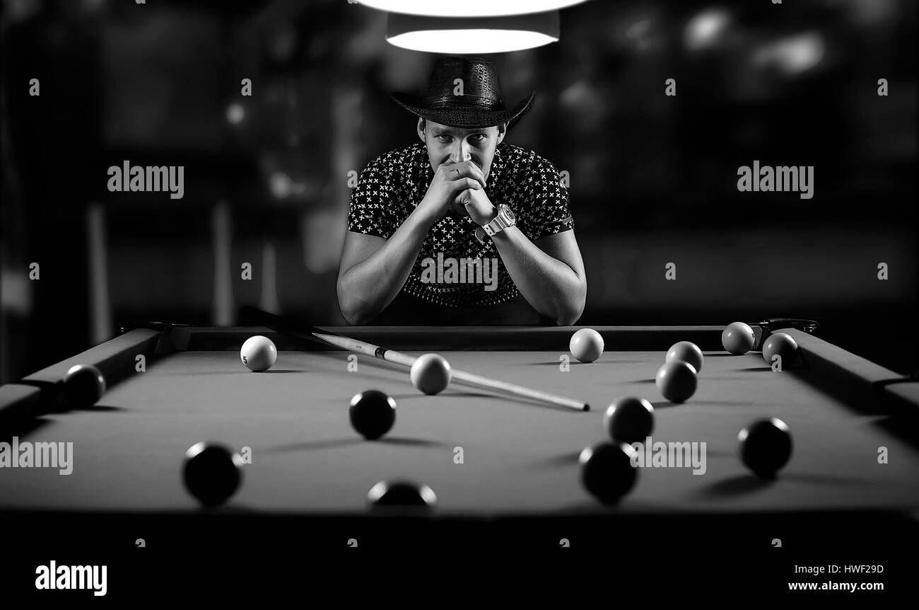 monochrome photo young man playing billiards Stock Photo - Alamy