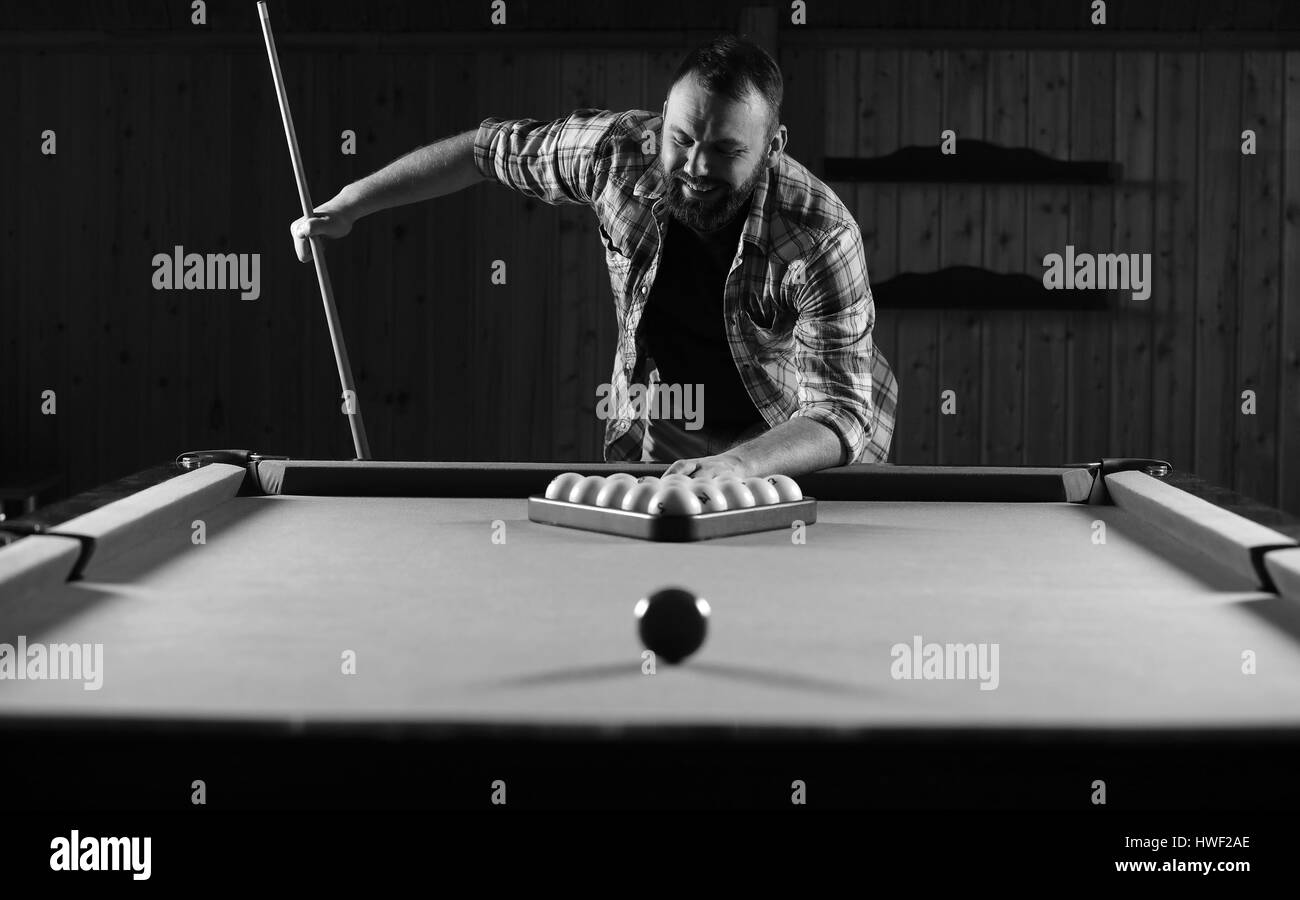 monochrome photo young man playing billiards Stock Photo - Alamy