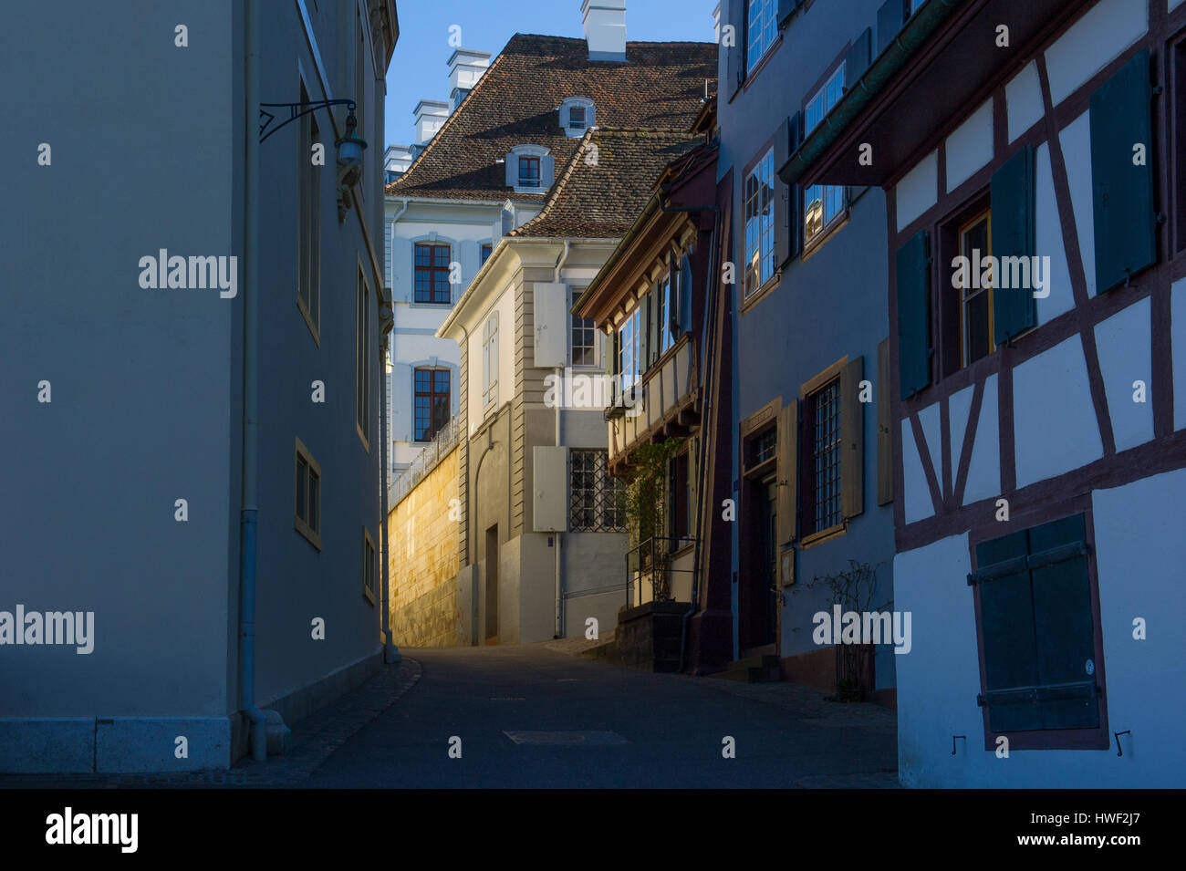 view of an alley with historic buildings in the old town of Basel ...