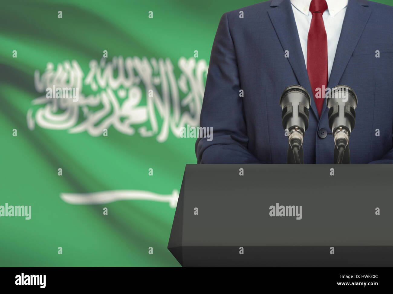 Businessman or politician making speech from behind the pulpit with ...