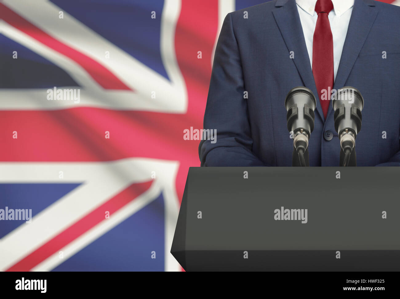 Businessman or politician making speech from behind the pulpit with ...