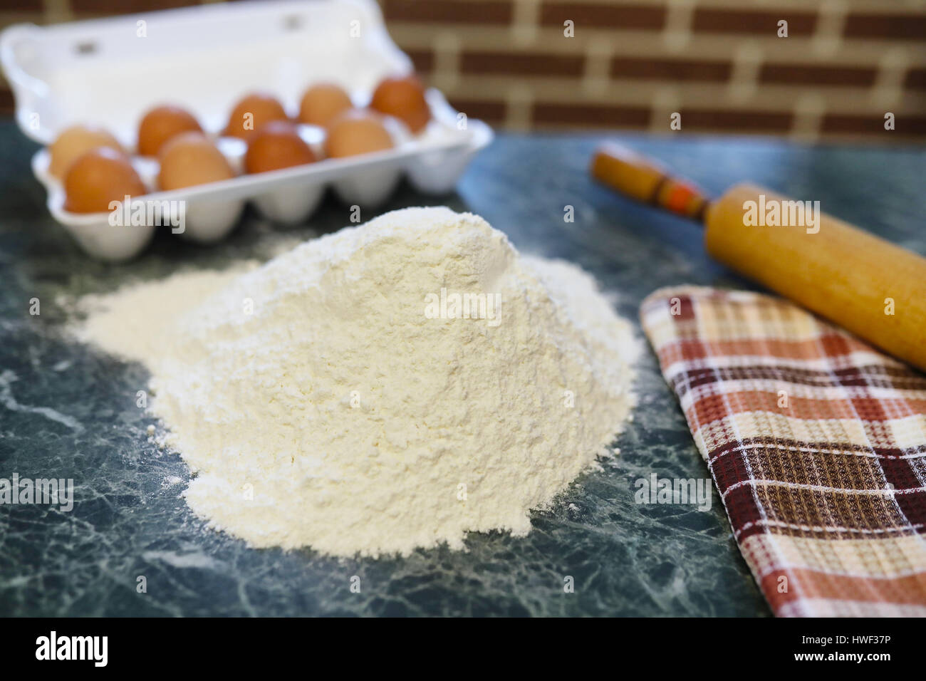 different ingredients for preparing flour products on kitchen ta Stock ...