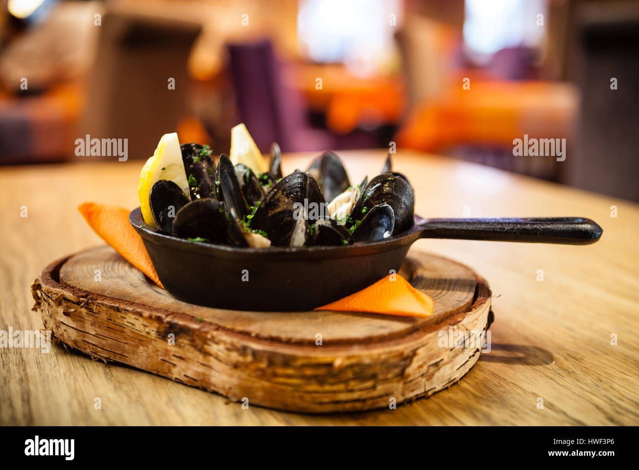 Steamed mussels with dressing Stock Photo - Alamy