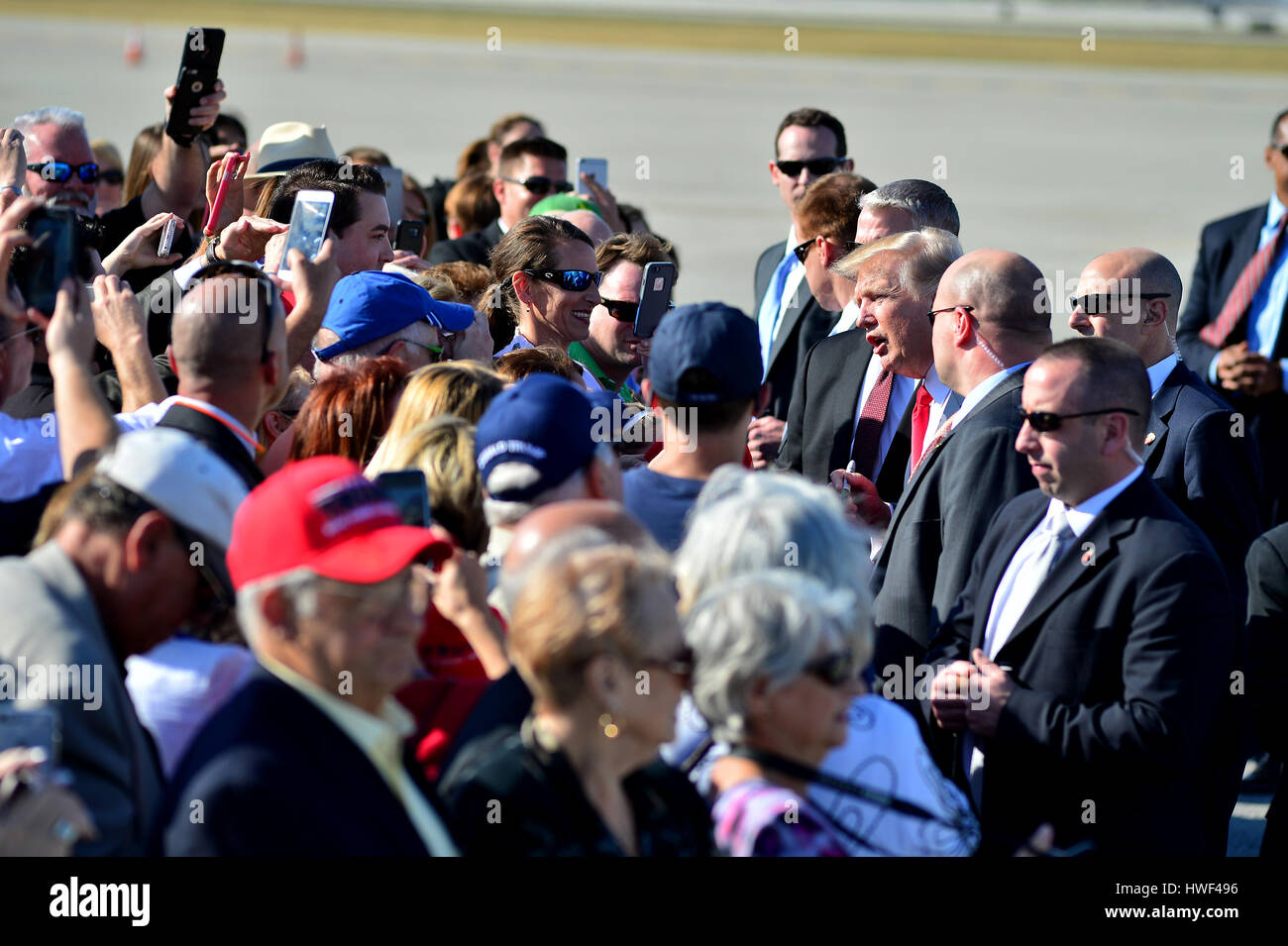 U.S. President Donald J. Trump waves as he arrives on Air Force One at ...