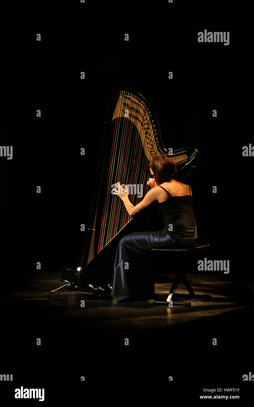 Female woman girl harpist harp playing hi-res stock photography and ...