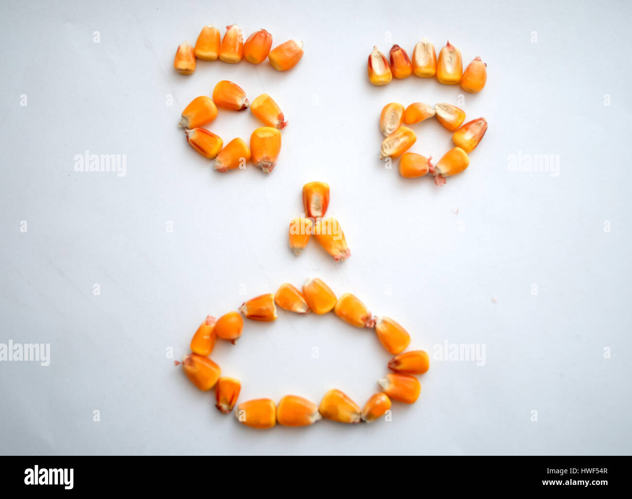 Healthy ecological corn surprised smiley face on a white background ...