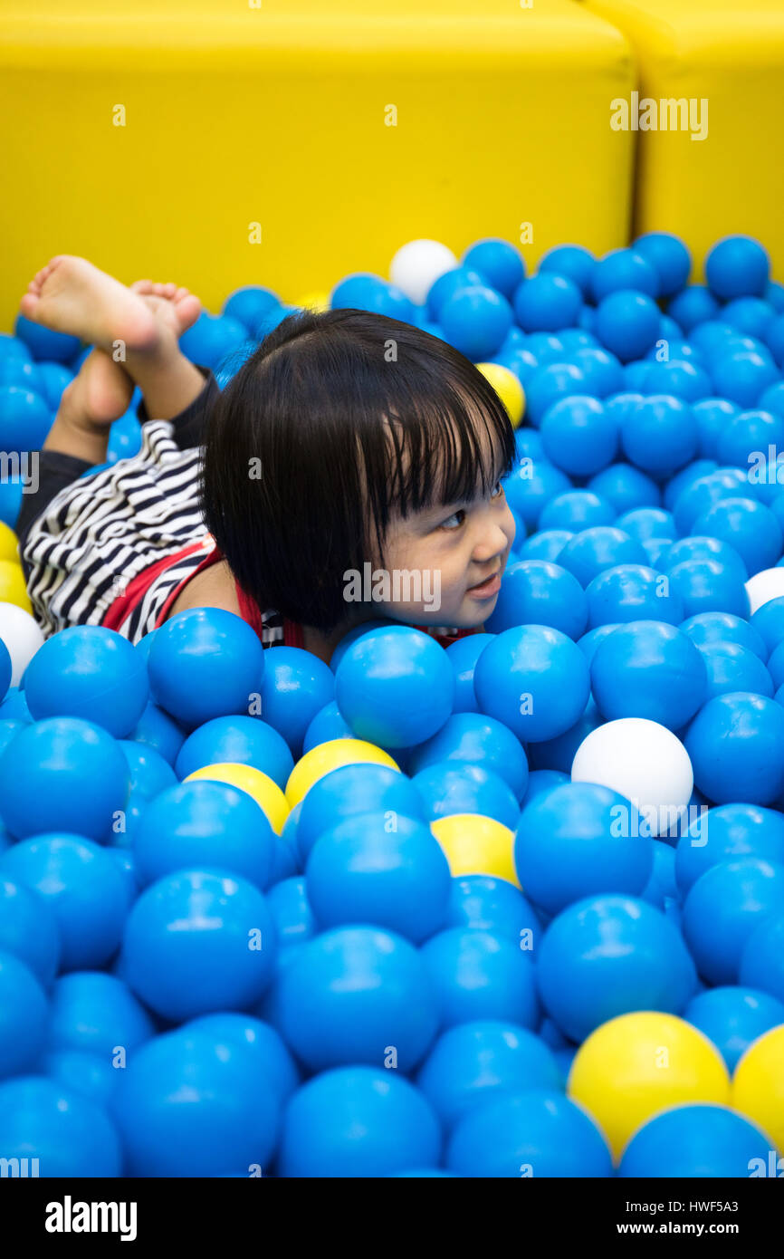 Malaysian children playing ball hi-res stock photography and images - Alamy