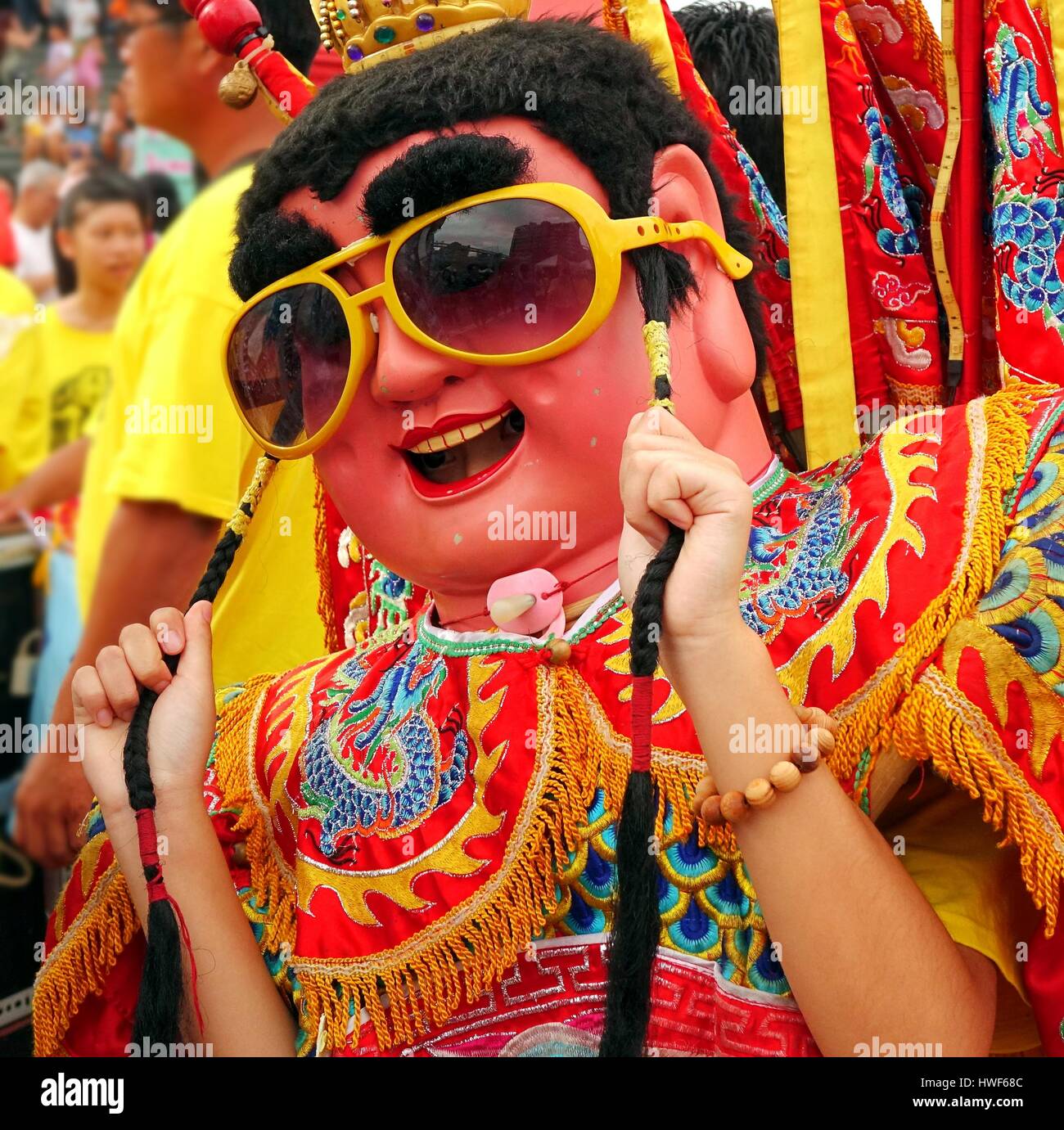 KAOHSIUNG, TAIWAN -- AUGUST 15, 2015: A dancer in a modernized costume ...