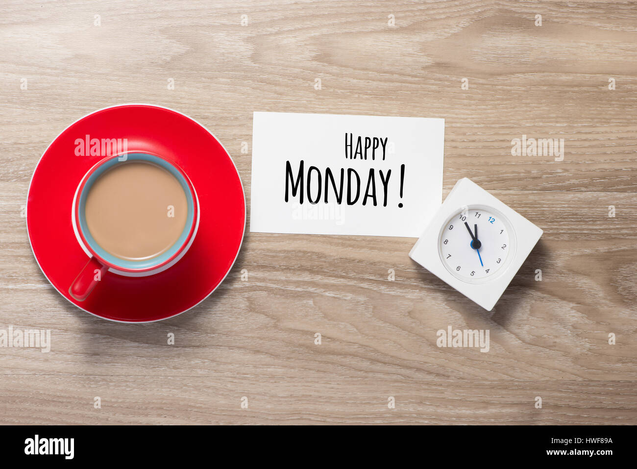 Happy Monday coffee cup on wooden background Stock Photo - Alamy