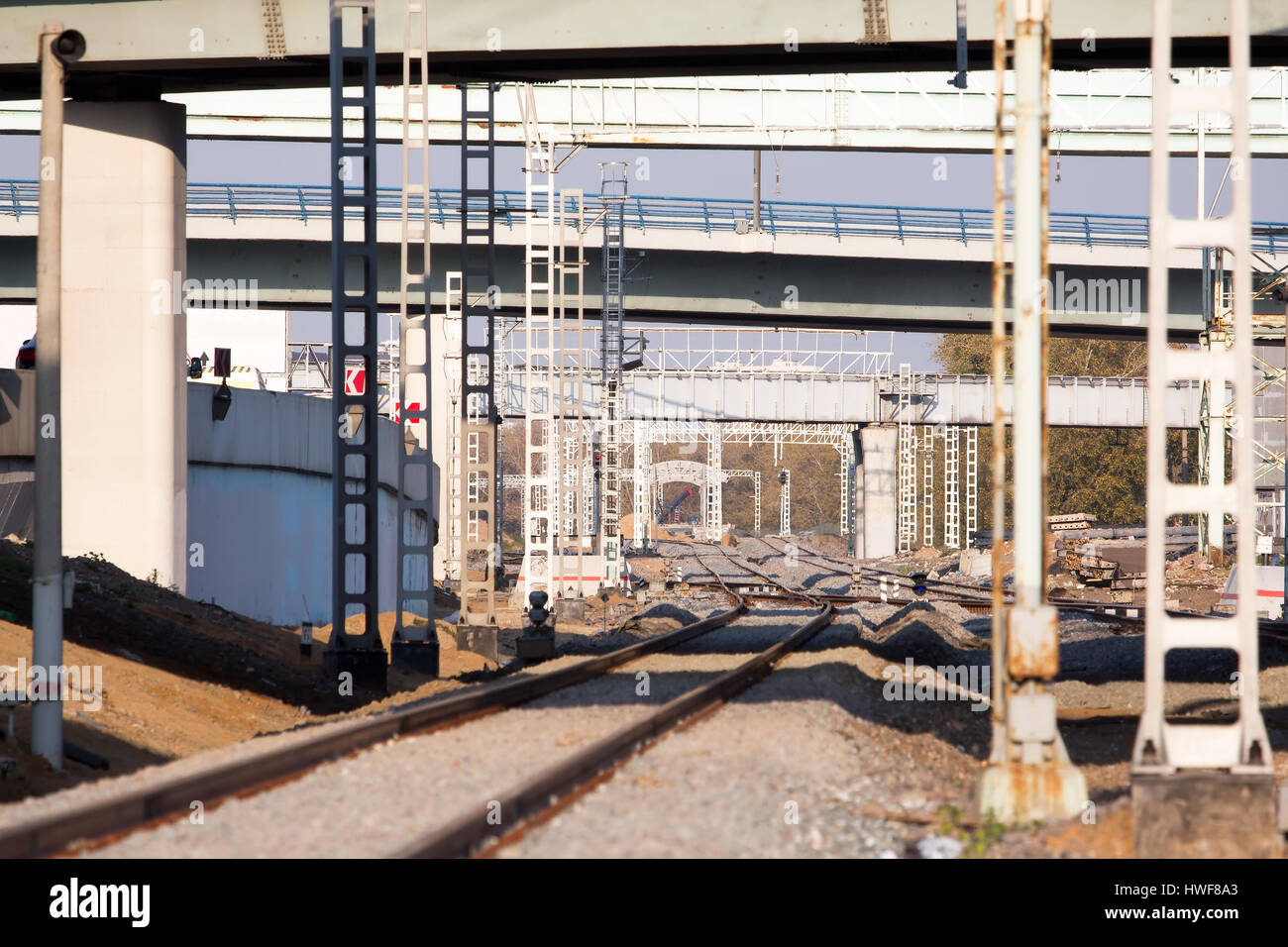 Railway path under the bridge Stock Photo - Alamy