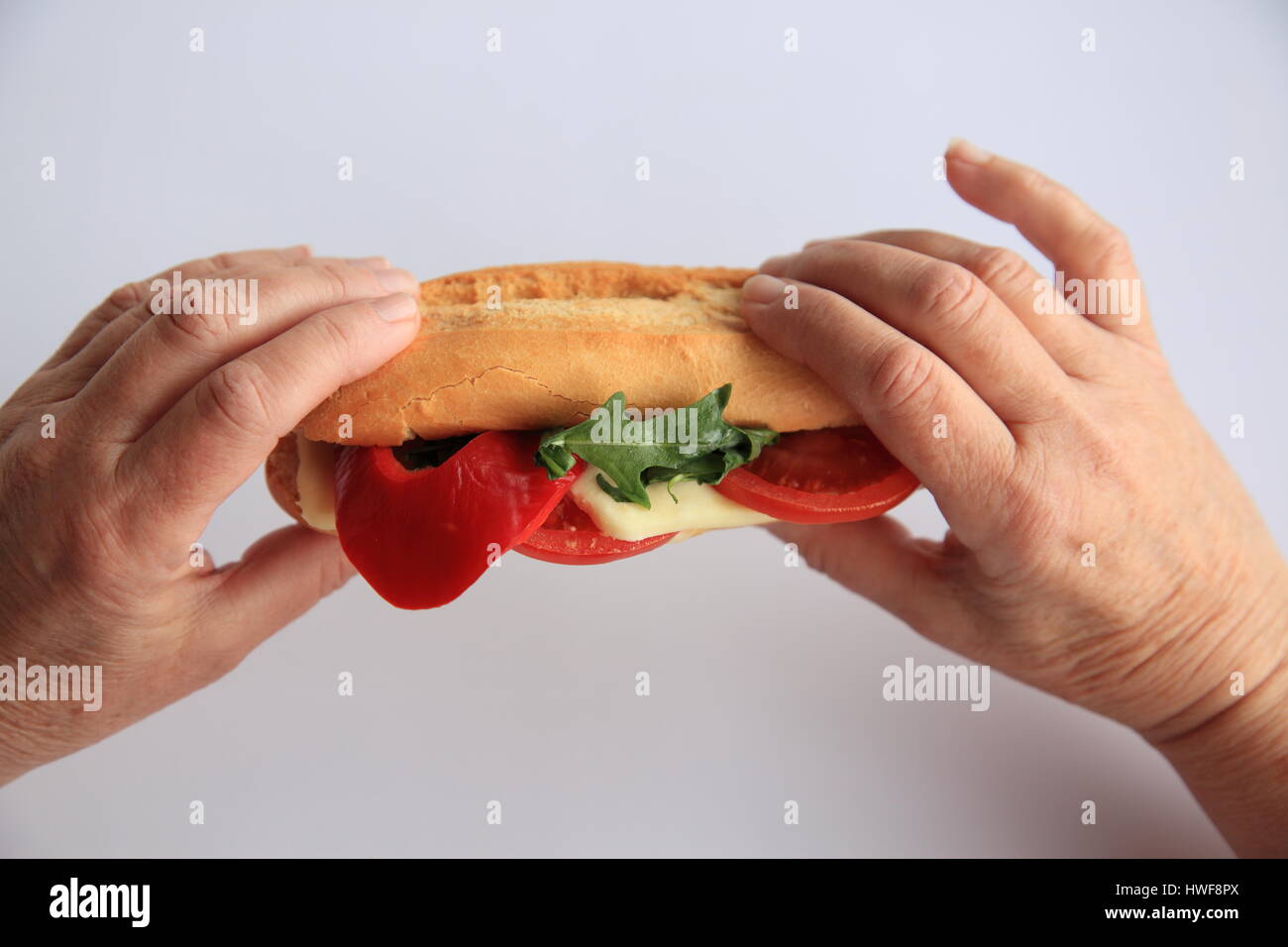 Sandwich and hands hi-res stock photography and images - Alamy