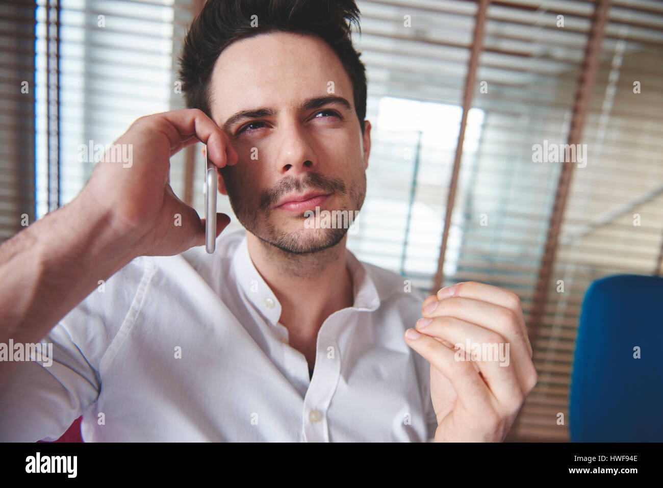 Working concentration looking up effort hi-res stock photography and ...