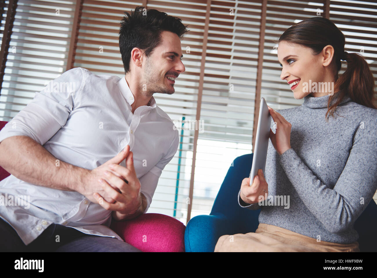 Business couple communicating every detail Stock Photo - Alamy