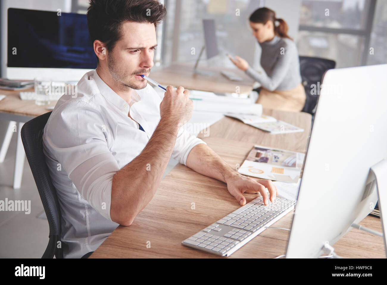 Two man working hard hi-res stock photography and images - Alamy