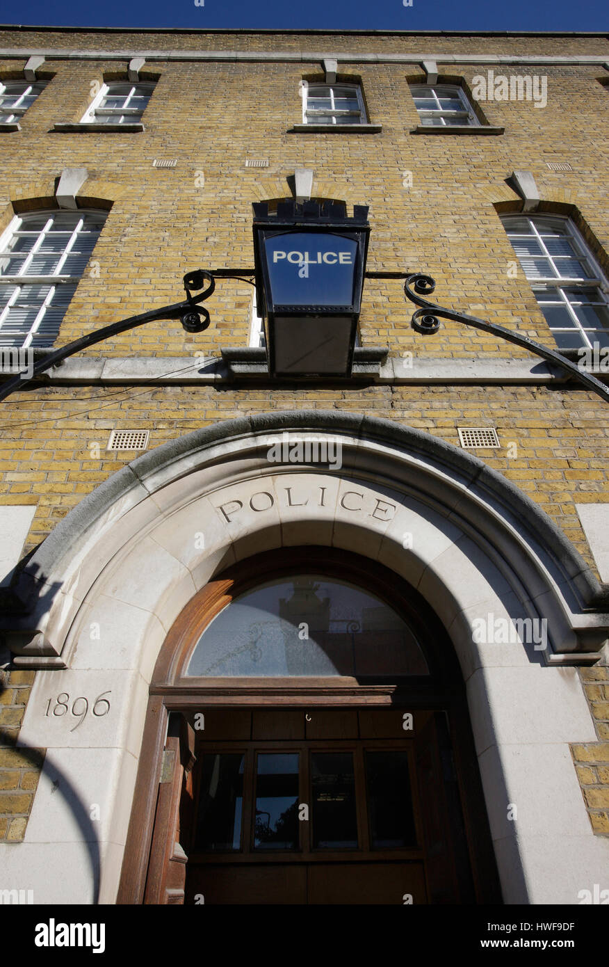 Police station entrance with blue illuminating police lamp hi-res stock ...