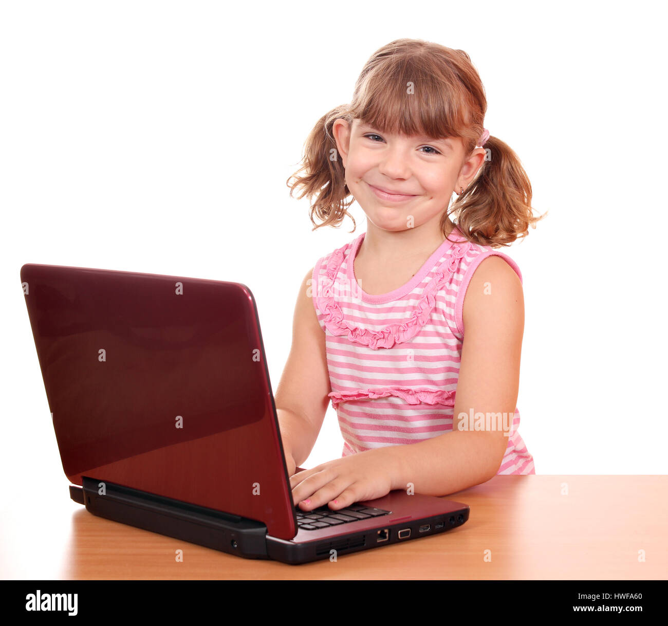 happy little girl with laptop Stock Photo - Alamy