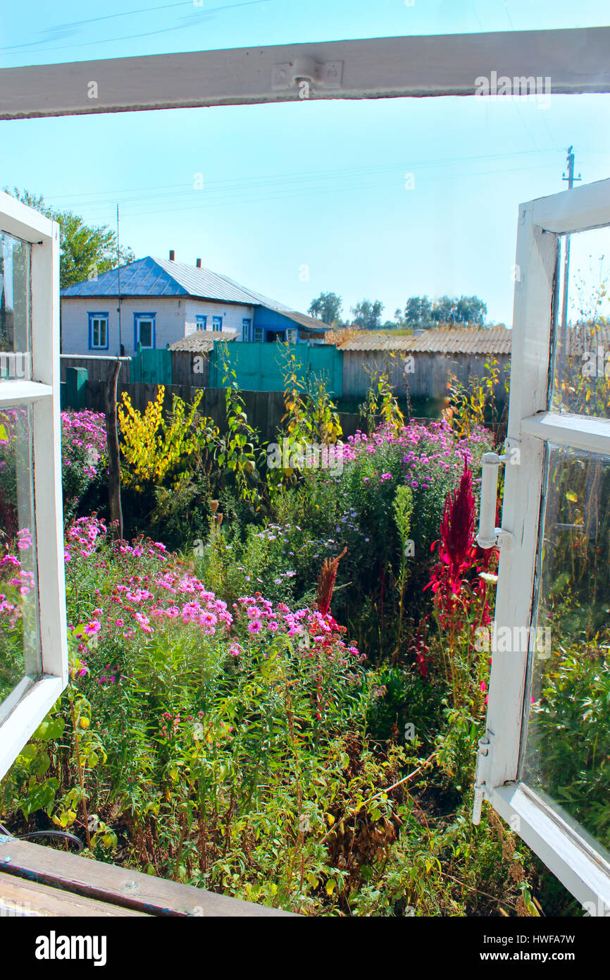window of small country house with view to summer Stock Photo - Alamy