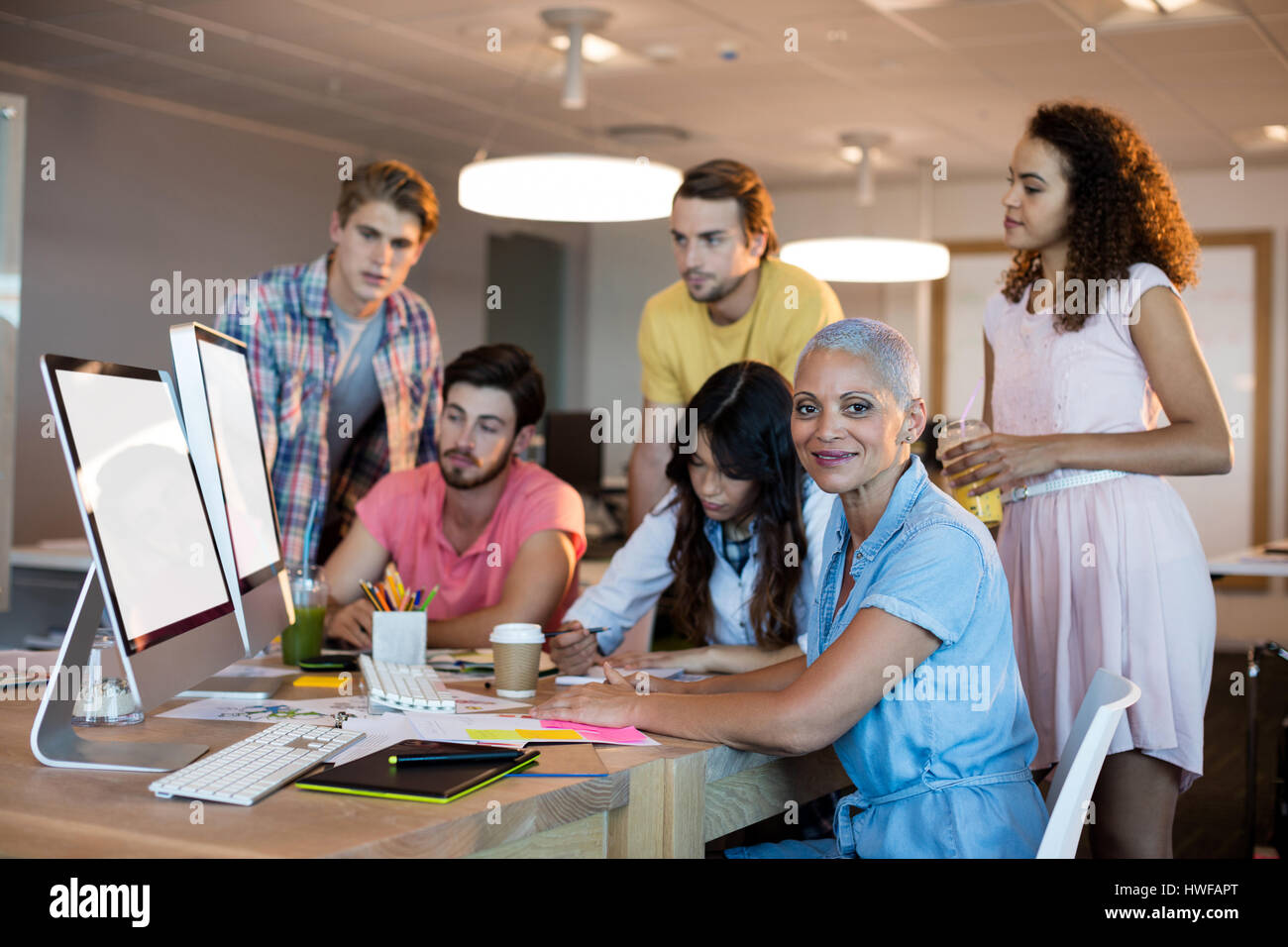 Creative business team discussing Stock Photo - Alamy