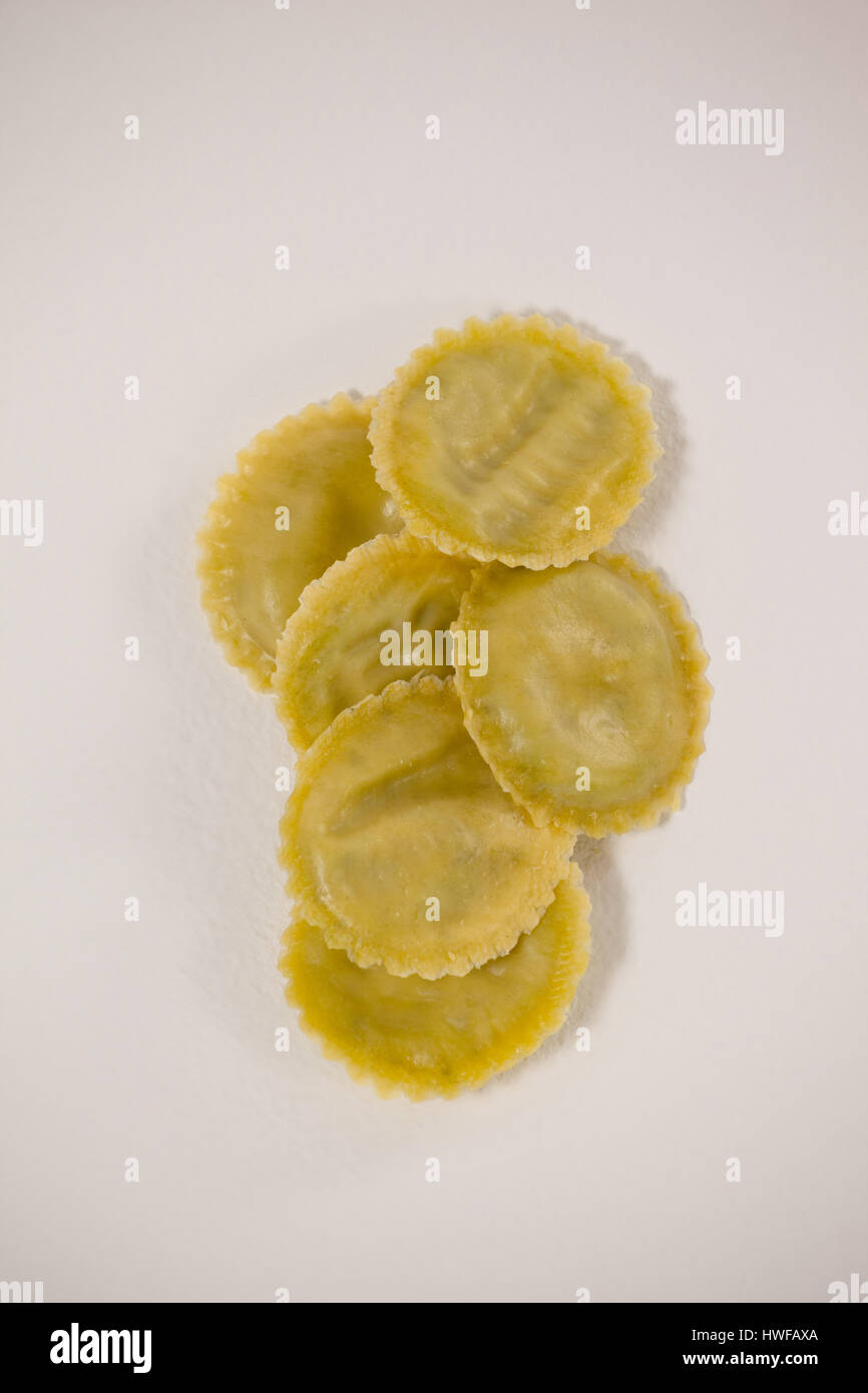 Round ravioli pasta isolated on white background Stock Photo - Alamy
