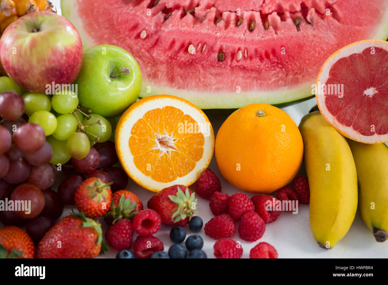 Close-up of various types of fruits on white background Stock Photo - Alamy