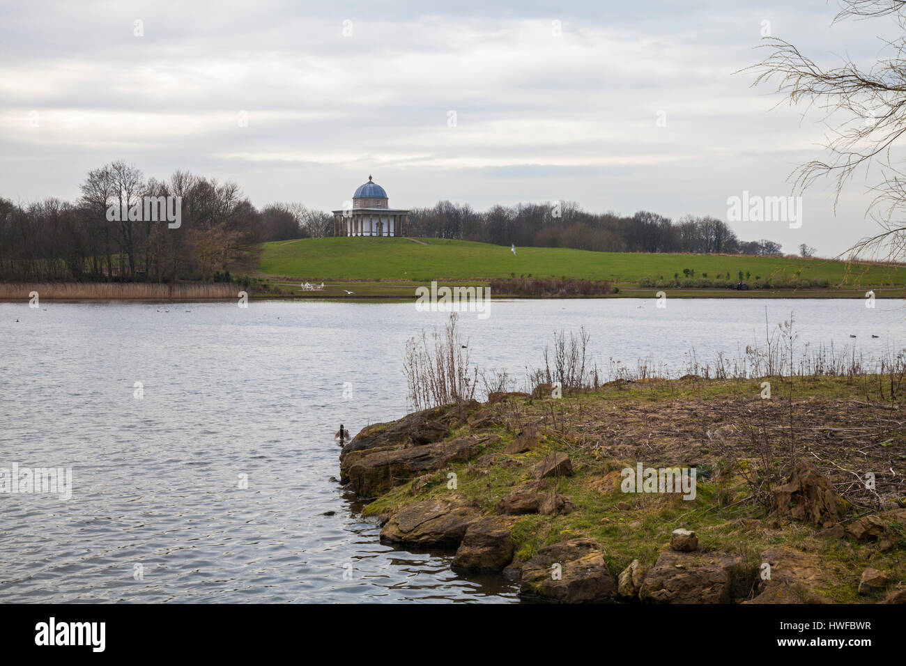 A scenic view of the Temple of Minerva across the lake in Hardwick Park ...