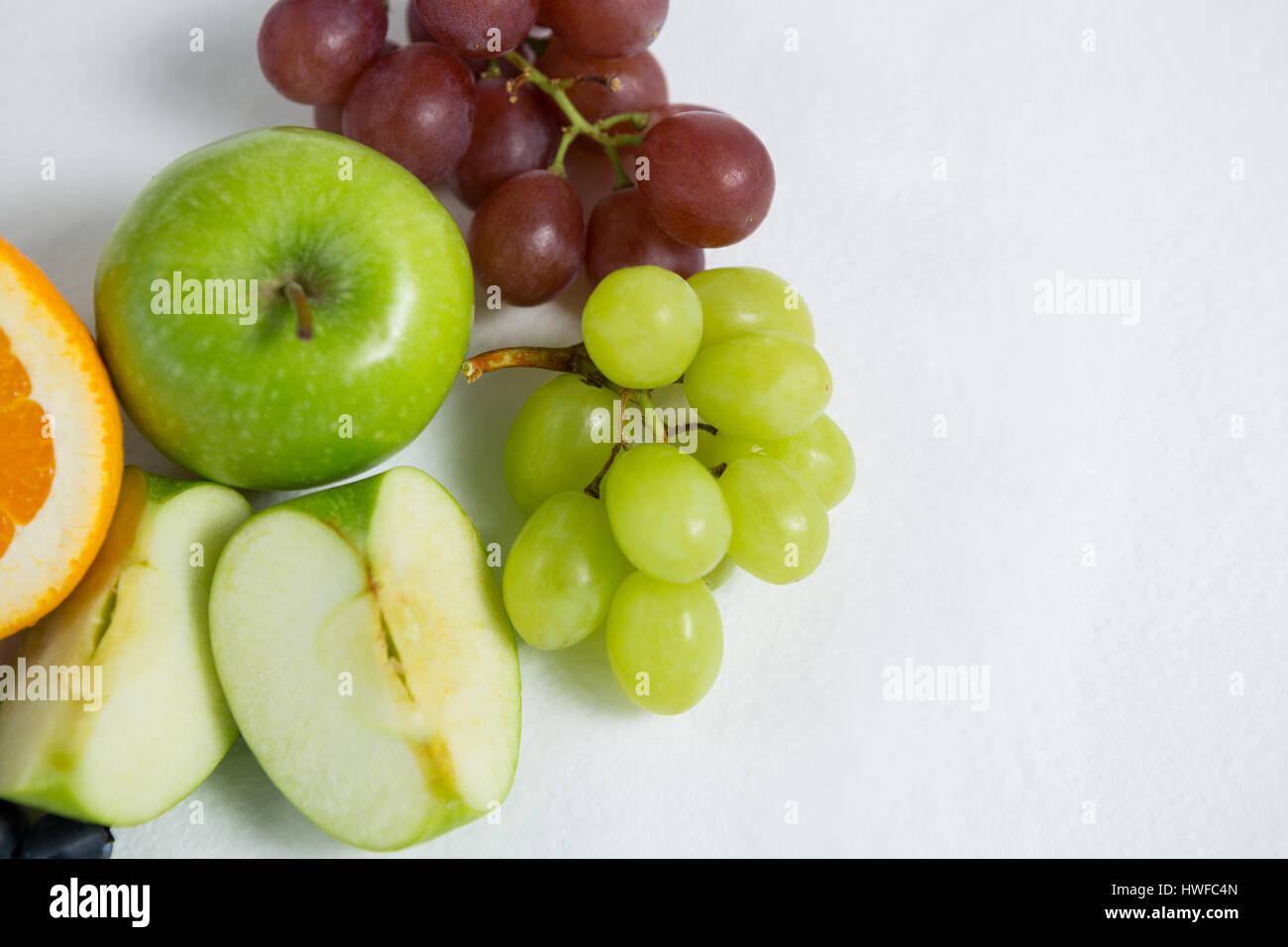 Close-up of various types of fruits on white background Stock Photo - Alamy