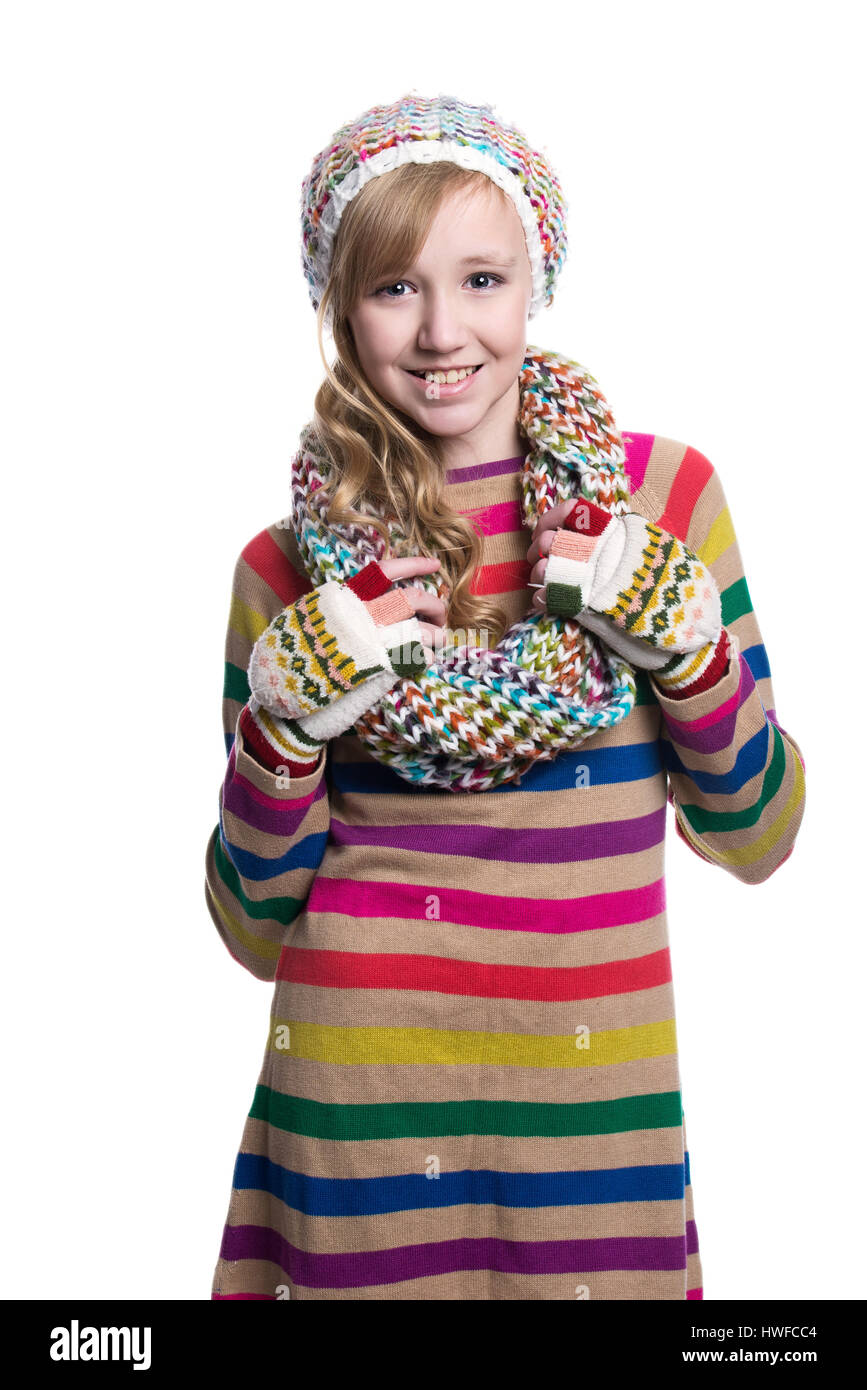 Cute cheerful teenage girl wearing colorful striped sweater, scarf ...