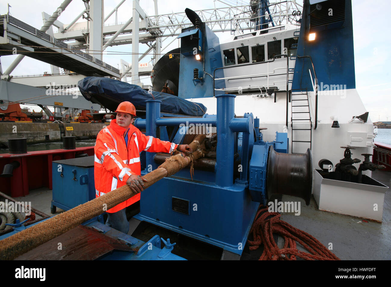 tugboat at work in rotterdam harbor Stock Photo - Alamy