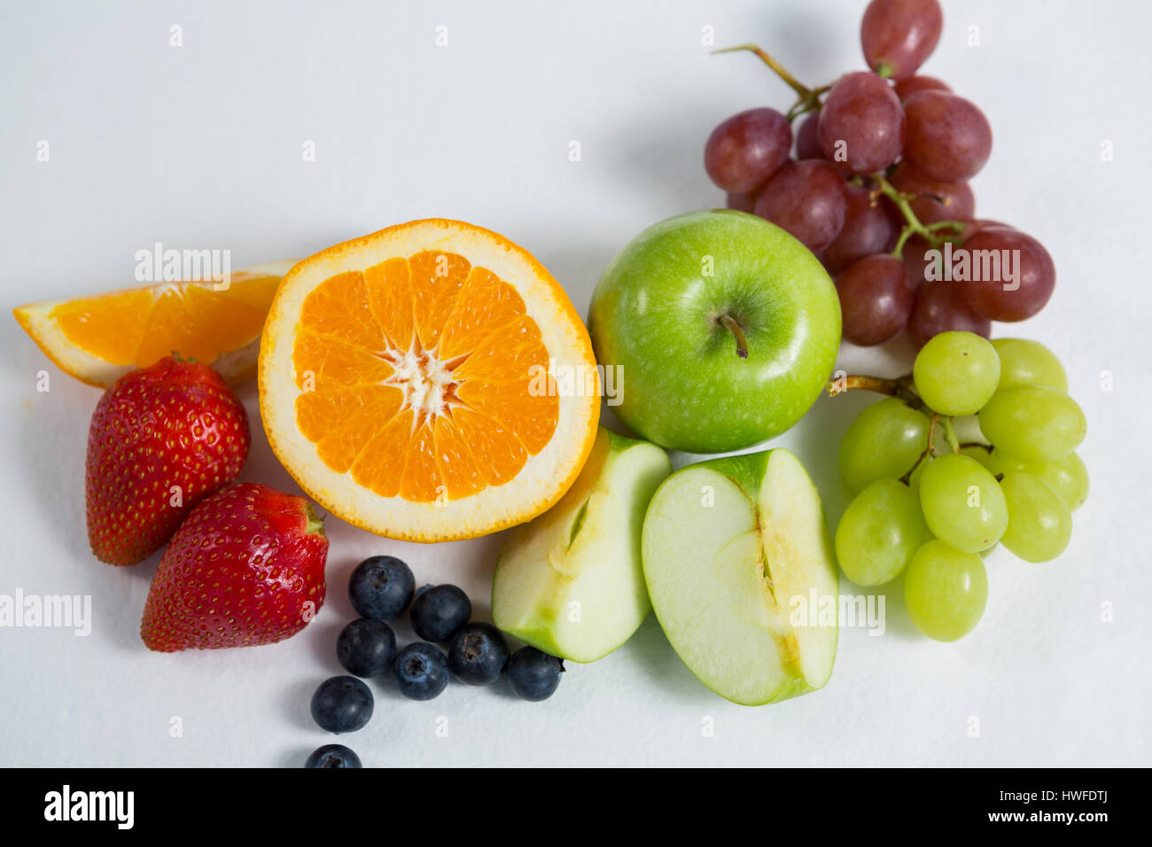 Close-up of various types of fruits on white background Stock Photo - Alamy