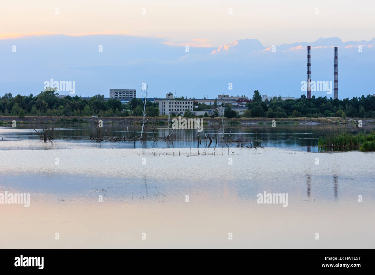 Sunset summer lake landscape with sun reflection on water surface (near ...