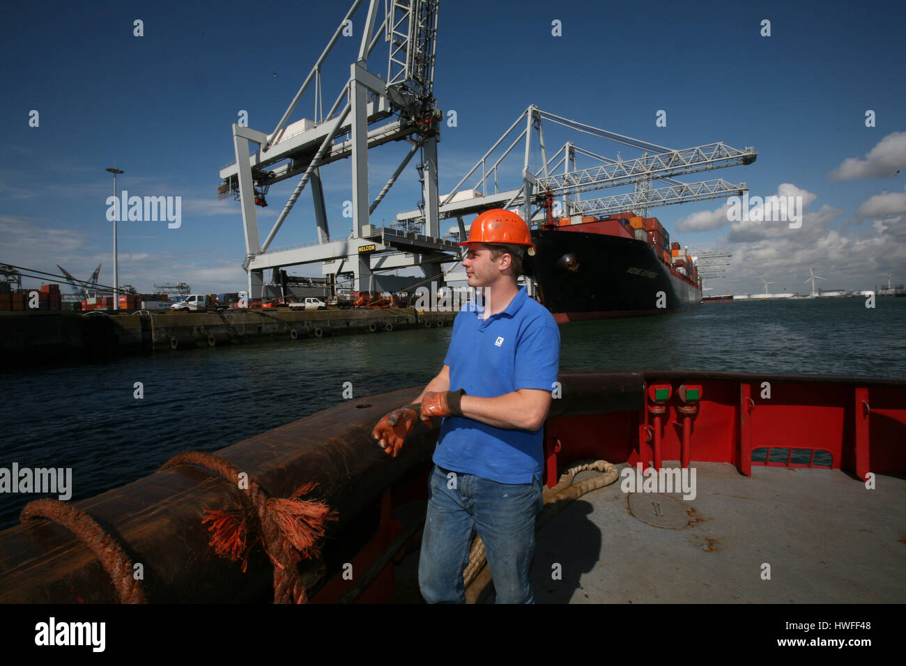 tugboat at work in rotterdam harbor Stock Photo - Alamy