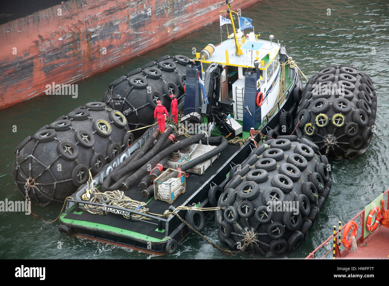 tugboat at work in rotterdam harbor Stock Photo - Alamy
