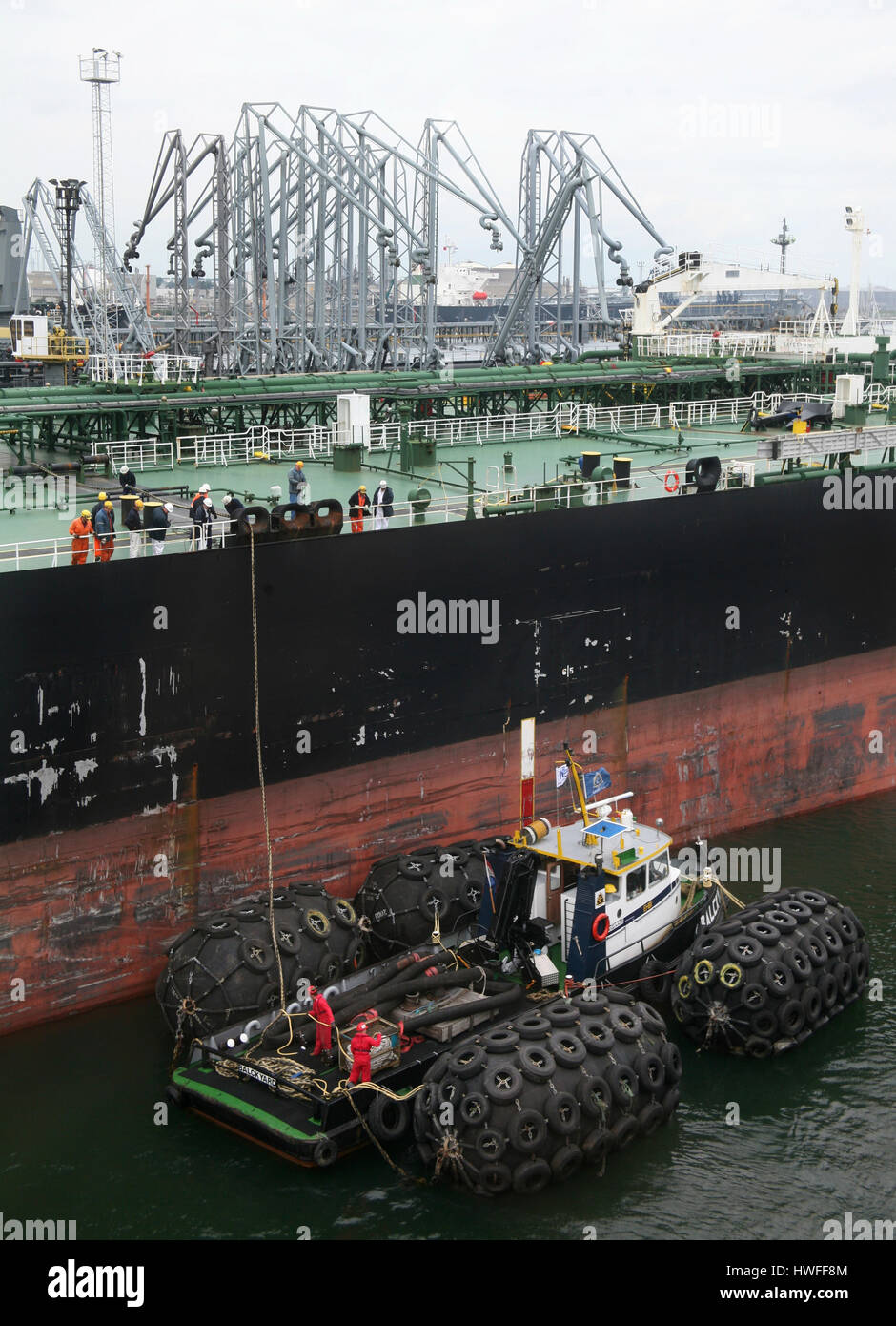 tugboat at work in rotterdam harbor Stock Photo - Alamy