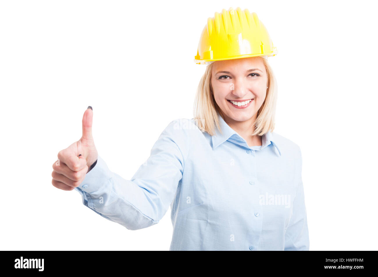 Female engineer showing like or thumb up gesture and smiling isolated ...