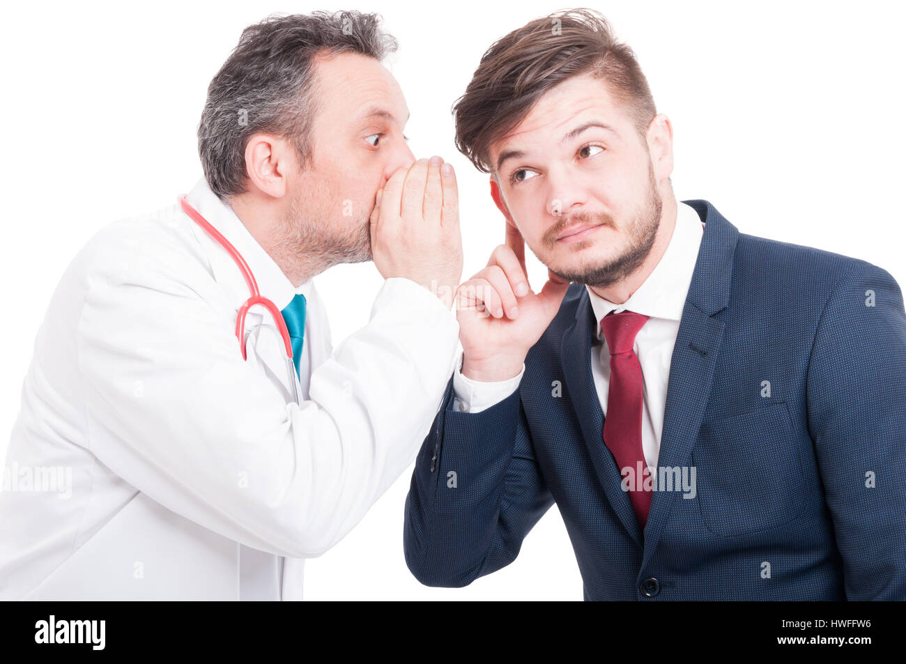 Telling a secret hi-res stock photography and images - Alamy