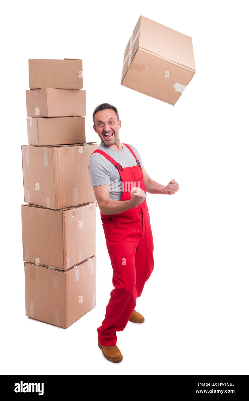 Full body of mover guy making winner gesture with cardboard boxes ...