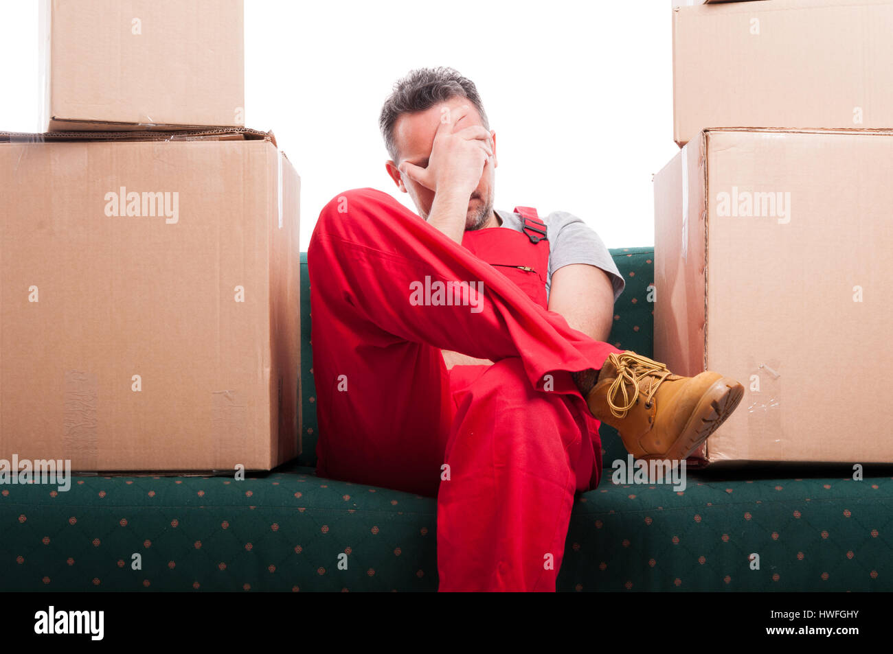 Sitting man sitting on boxes hi-res stock photography and images - Alamy