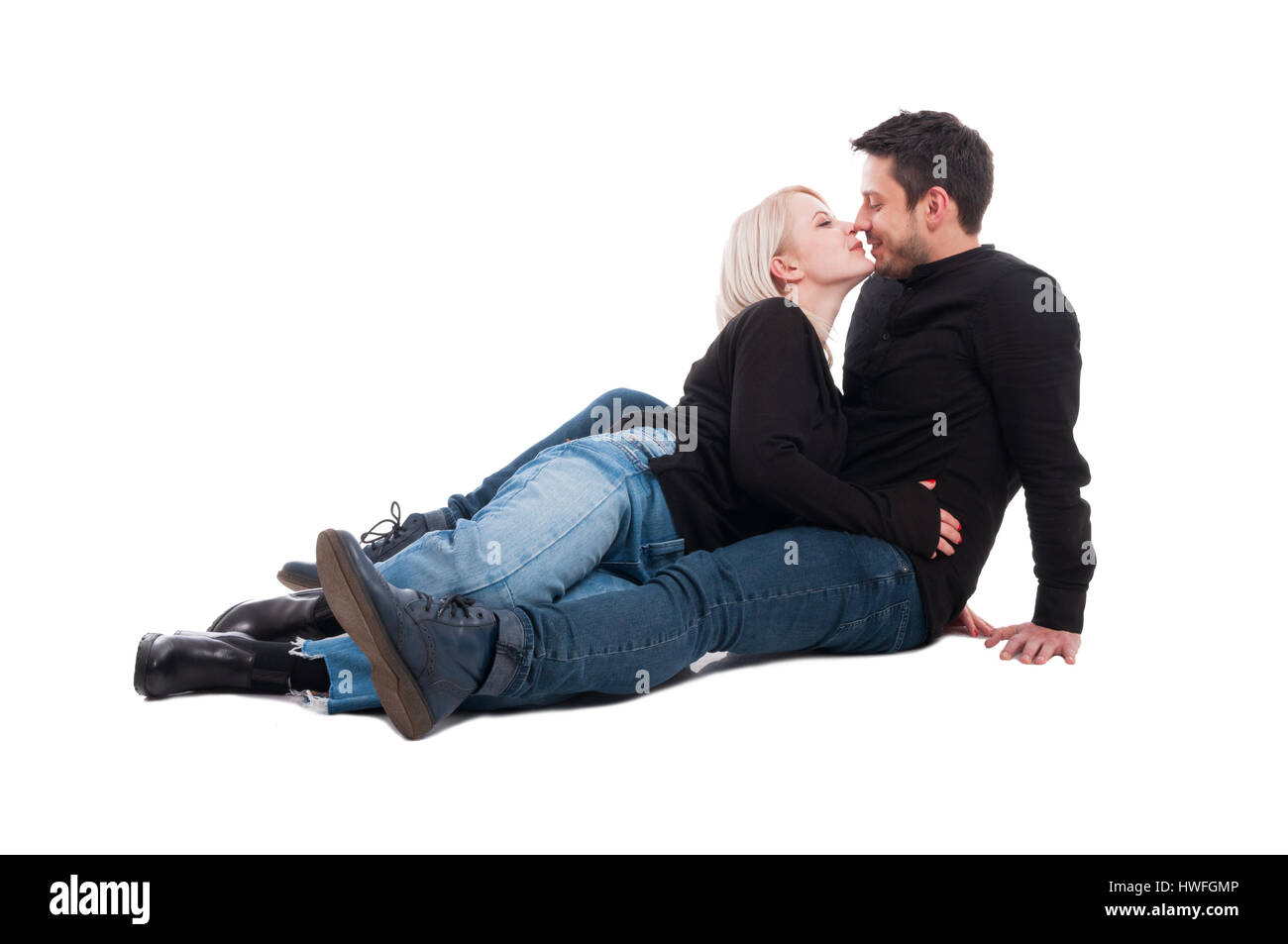 Two people sitting close to each other and showing affection isolated ...
