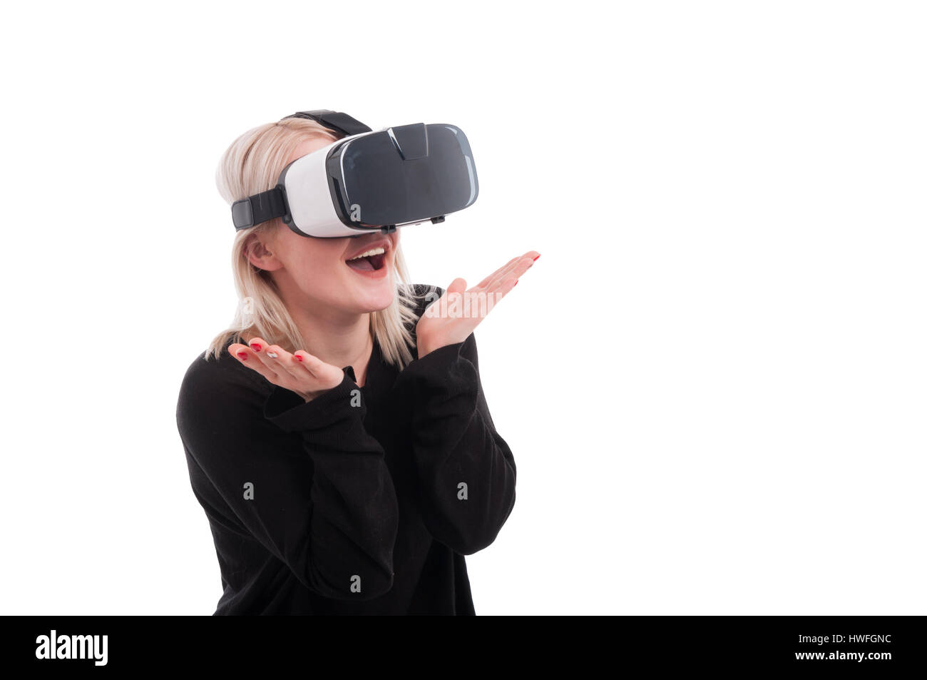 Pretty girl experiencing virtual reality through VR headset isolated on ...