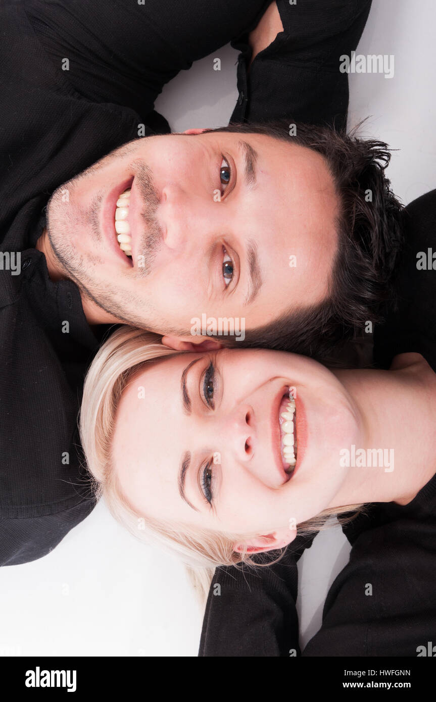 Pair laying together hi-res stock photography and images - Alamy