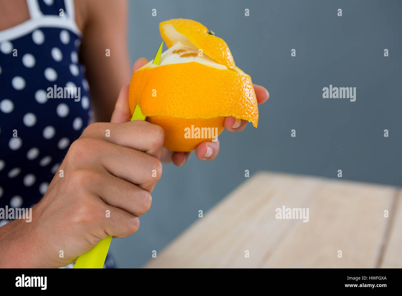 Woman peeling fresh ripe hi-res stock photography and images - Alamy
