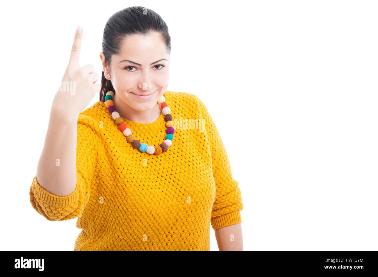 Cheerful woman pointing up one finger or counting one on white ...