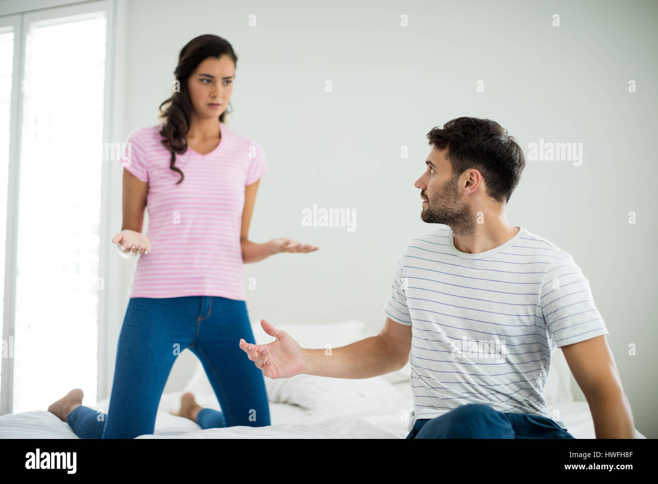 Couple arguing in bed bedroom hi-res stock photography and images - Alamy