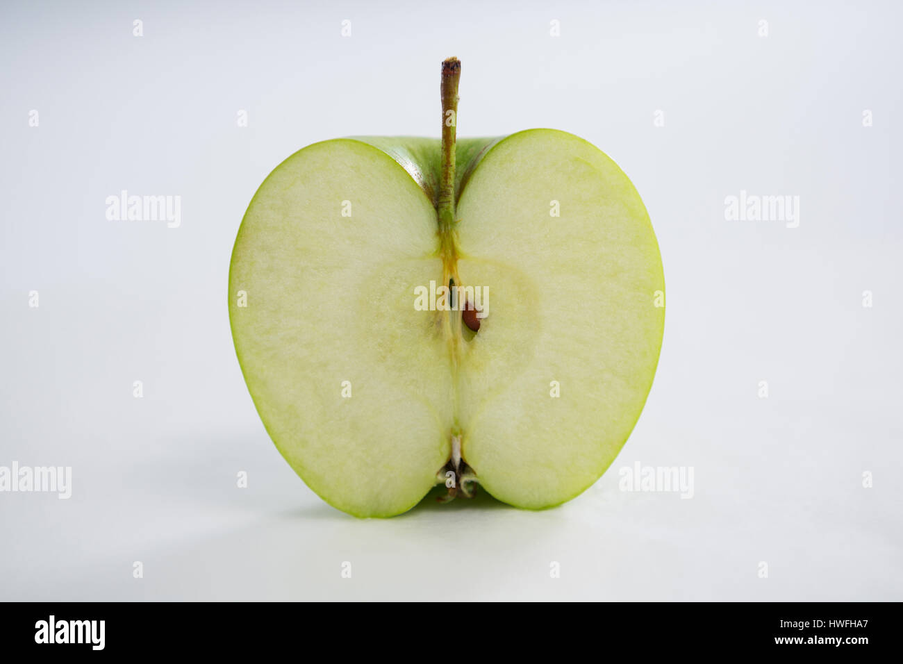 Halved green apple hi-res stock photography and images - Alamy