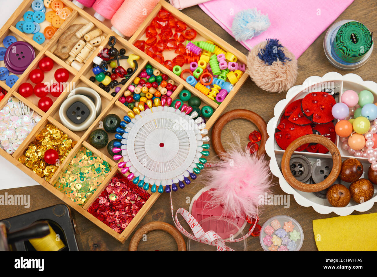 embroidery and sewing accessories top view, seamstress workplace, many ...