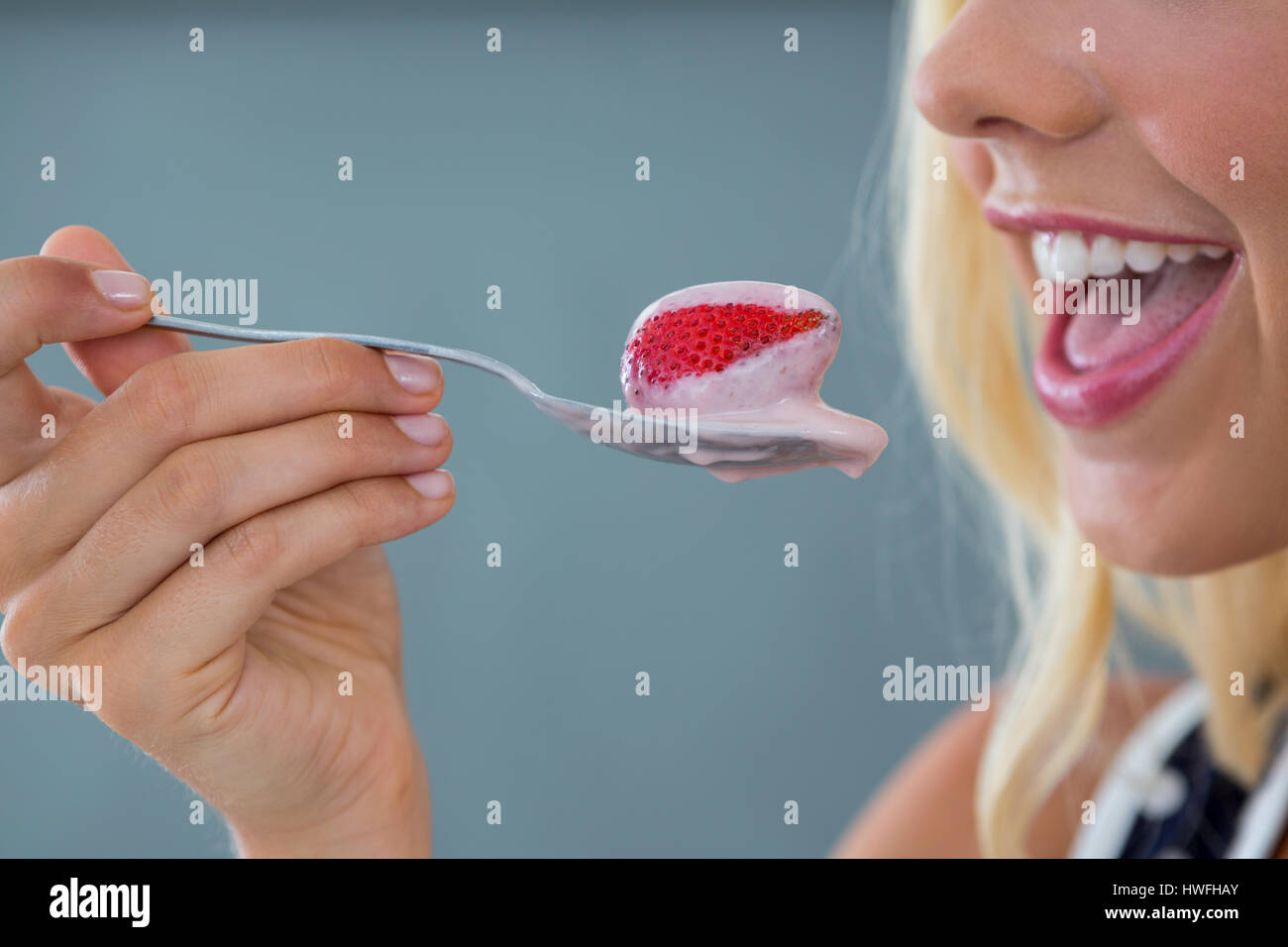 Woman eating whipped cream hi-res stock photography and images - Alamy